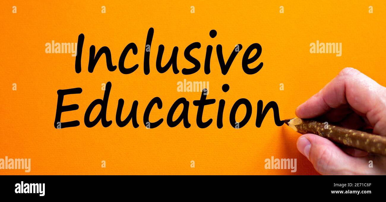 Inclusive education symbol. Hand writing 'inclusive education ...