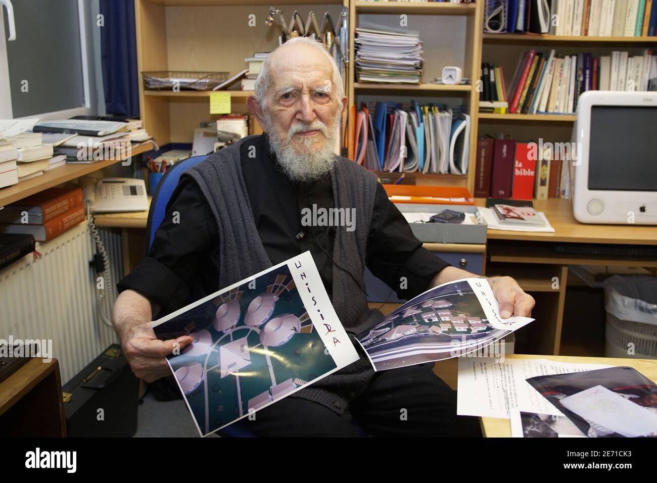 French catholic priest Abbe Pierre poses at home in Alfortville, near ...
