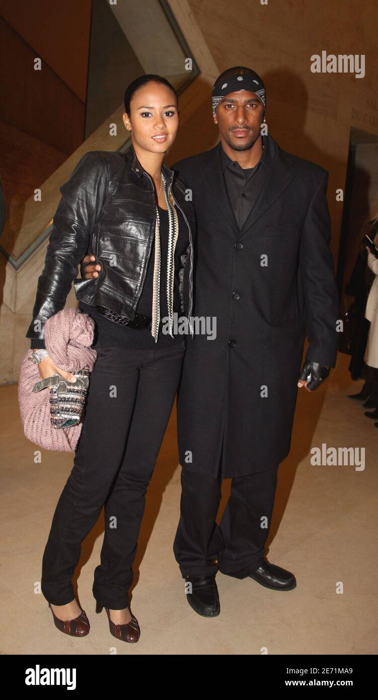 French singer Stomy Bugsy and his girlfriend attend Francesco Smalto ...