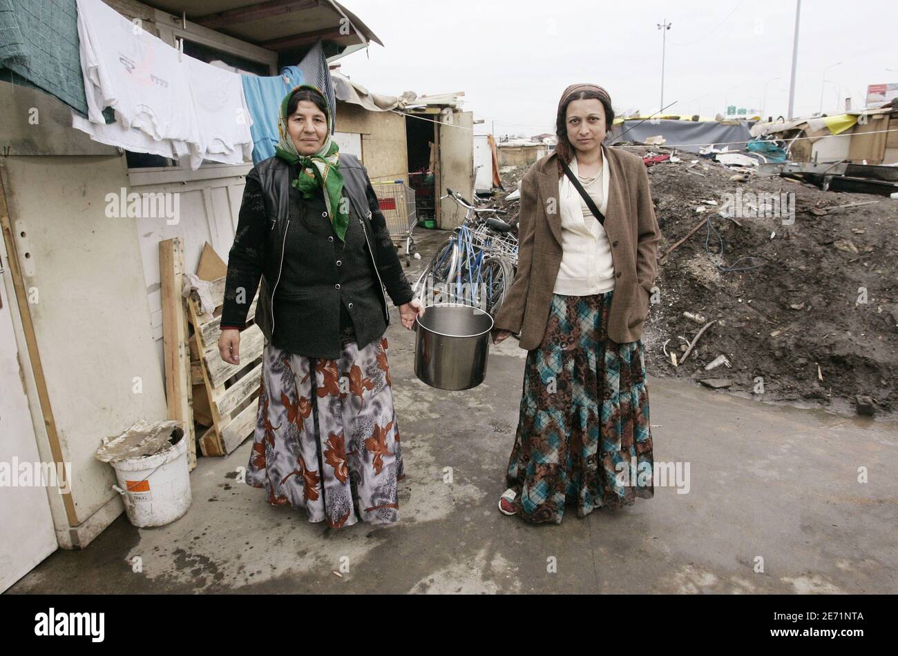 Romanian gypsy (roms) families live in new shanty towns in the northern ...