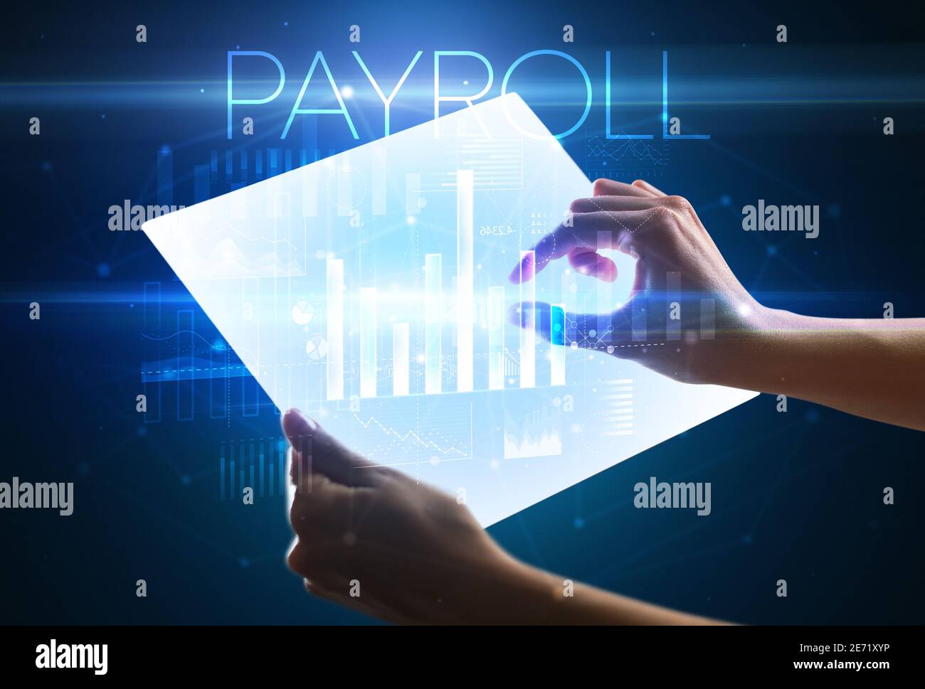 Hand holding futuristic tablet with PAYROLL inscription above, modern ...