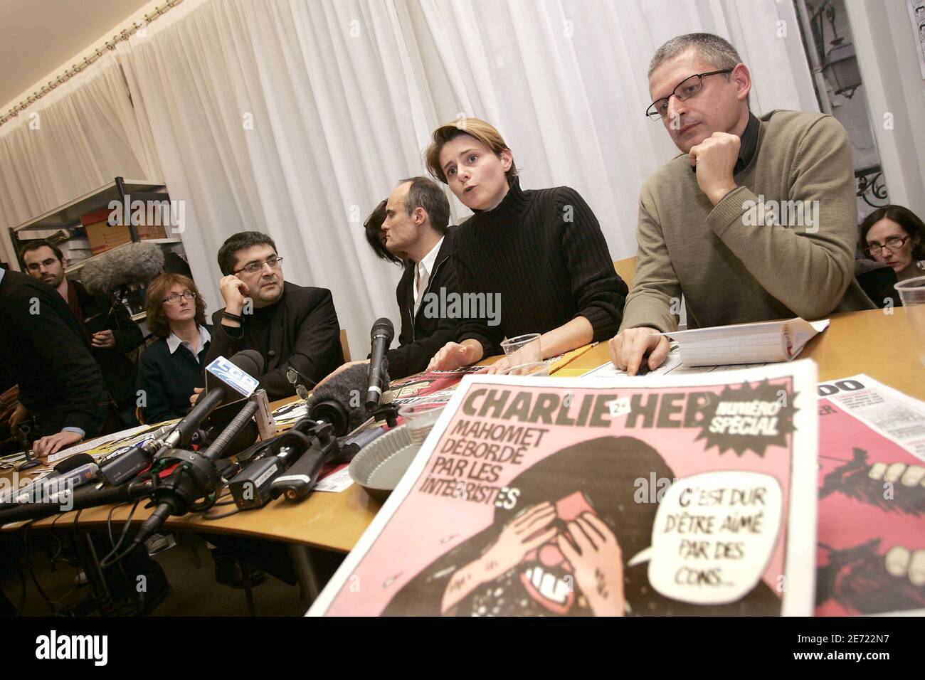 French satiric newspaper, Charlie Hebdo, holds a press conference the day before will be taken ...