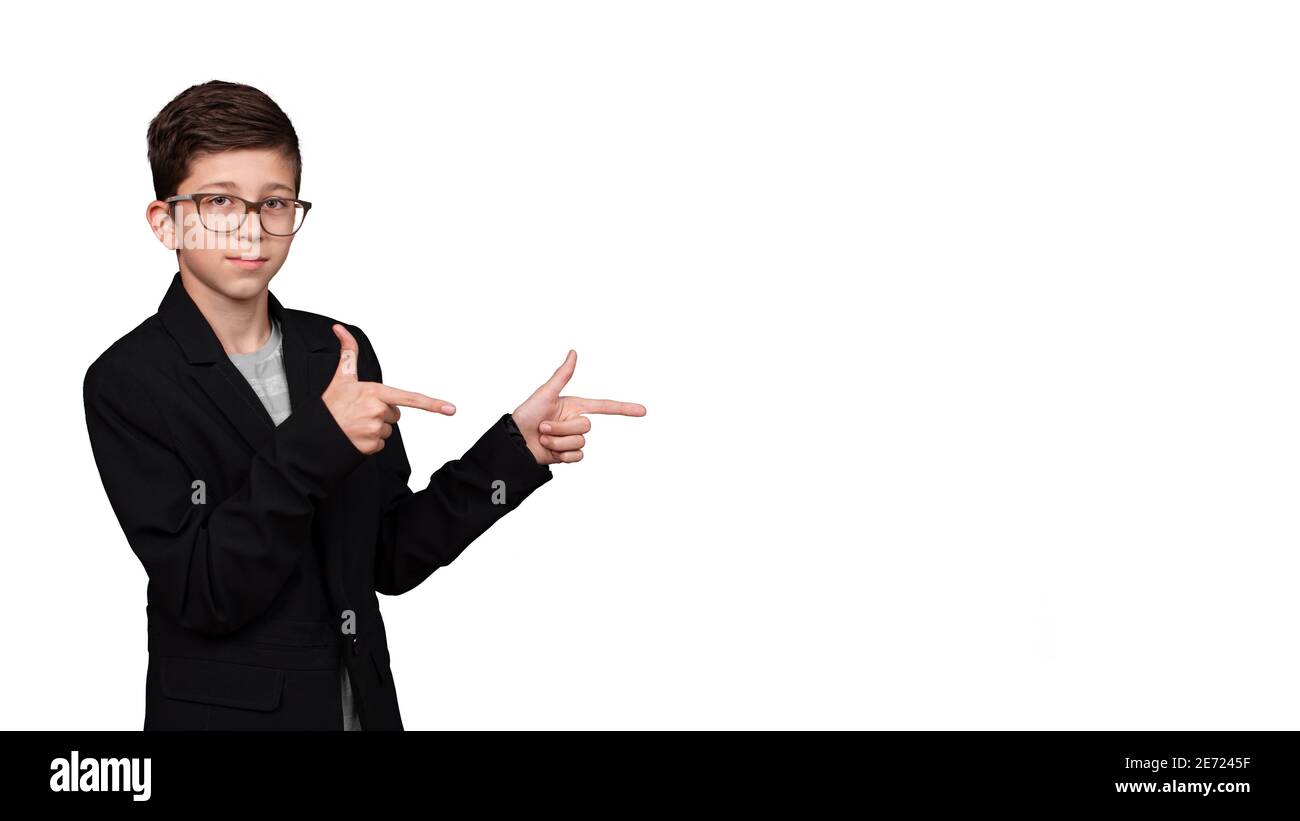 Boy teen point his hands to empty place with copy space. Isolated on ...