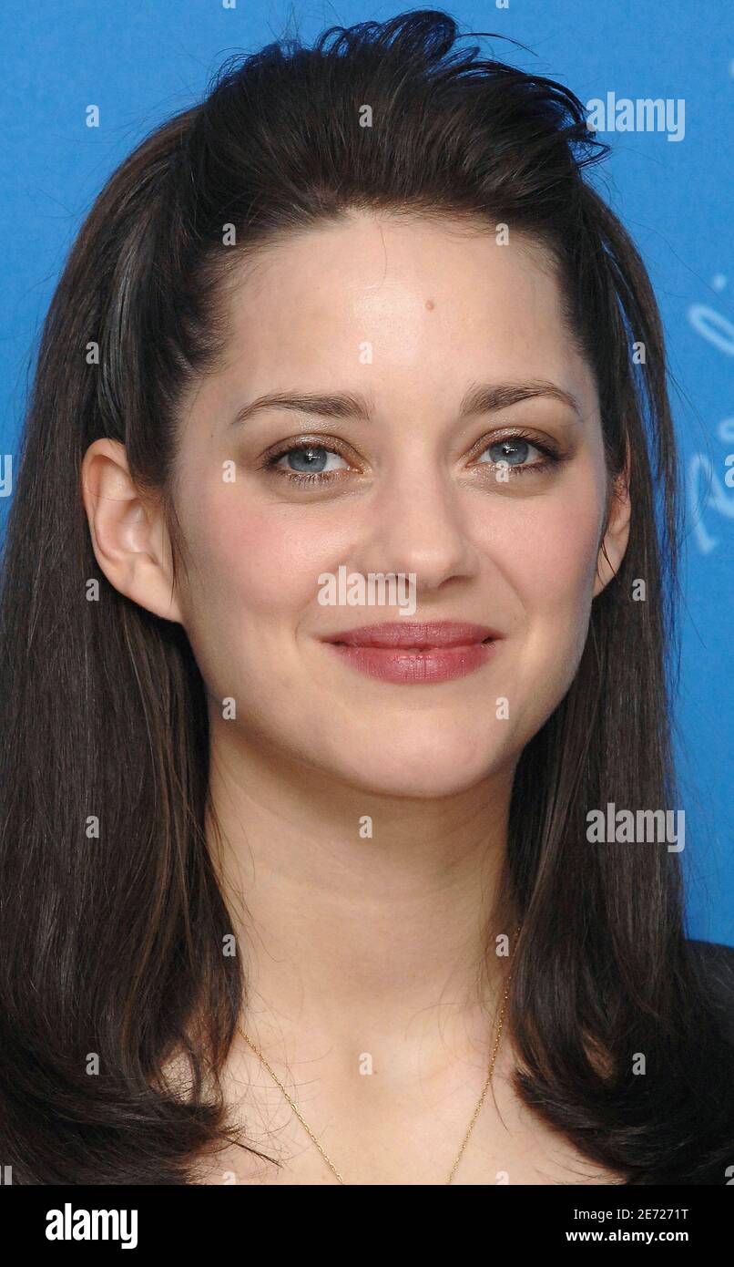 French Actress Marion Cotillard poses for photographers during a ...