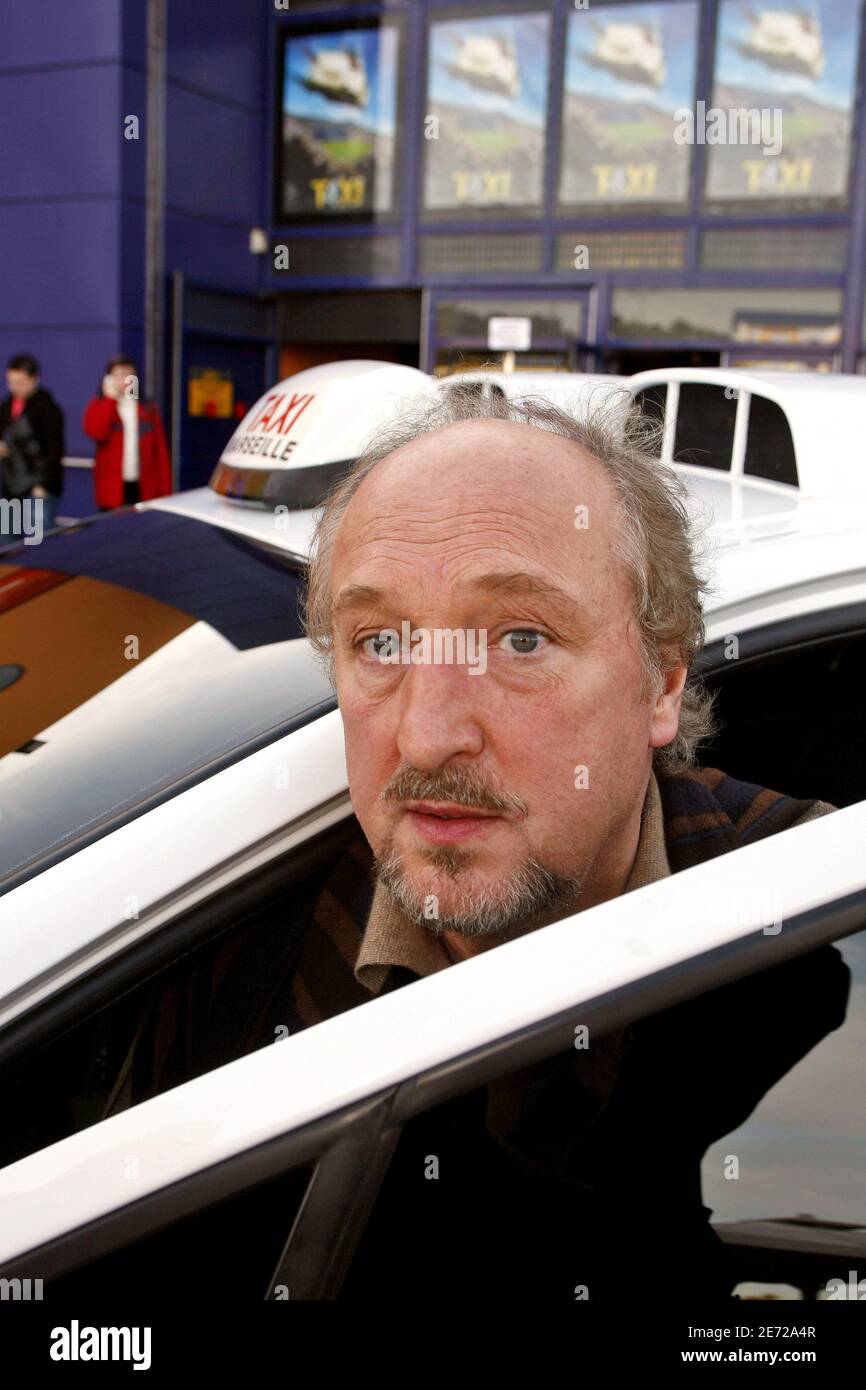 Bernard Farcy poses before the projection of the new opus of Gerard Krawczyk 'Taxi 4' in Plan de ...