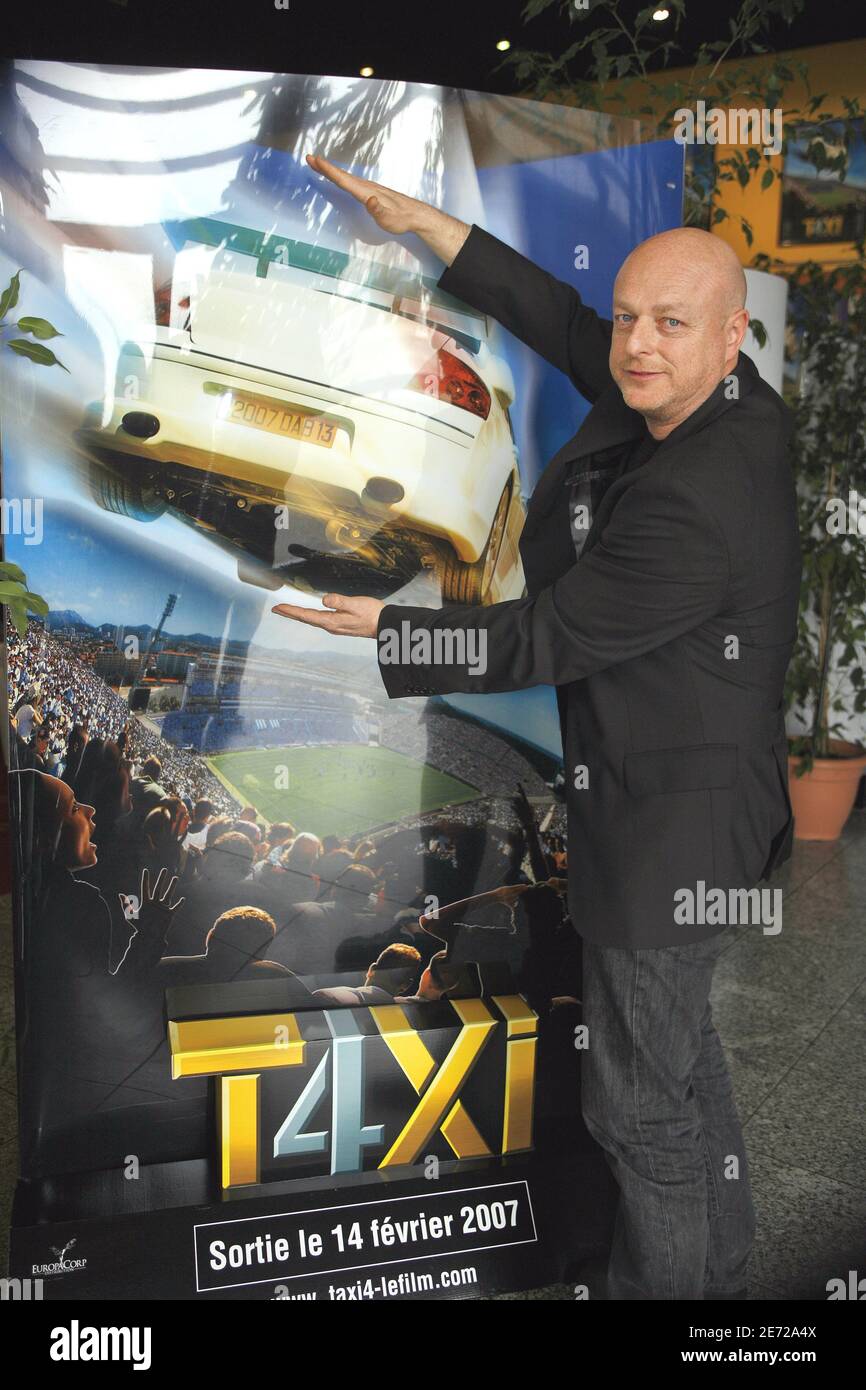 Gerard Krawczyk, poses before the projection of his new opus 'Taxi 4' in Plan de Campagne, near ...