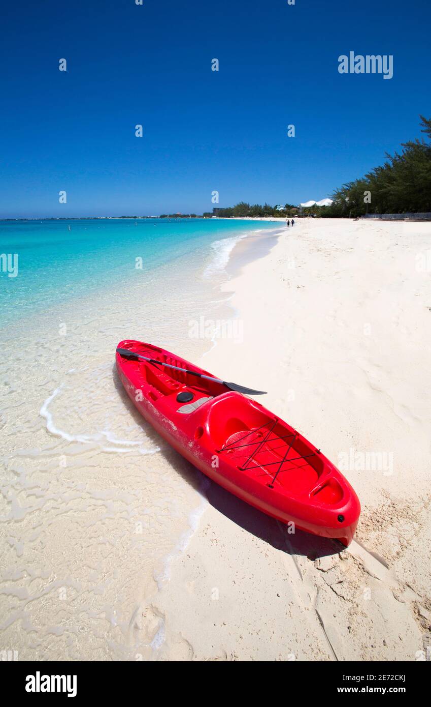 Seven Mile Beach, Red Kayak on water's edge, Grand Cayman, Cayman ...