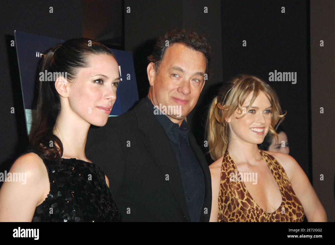 Producer Tom Hanks (C) poses with actresses Rebecca Hall (L) and Alice ...