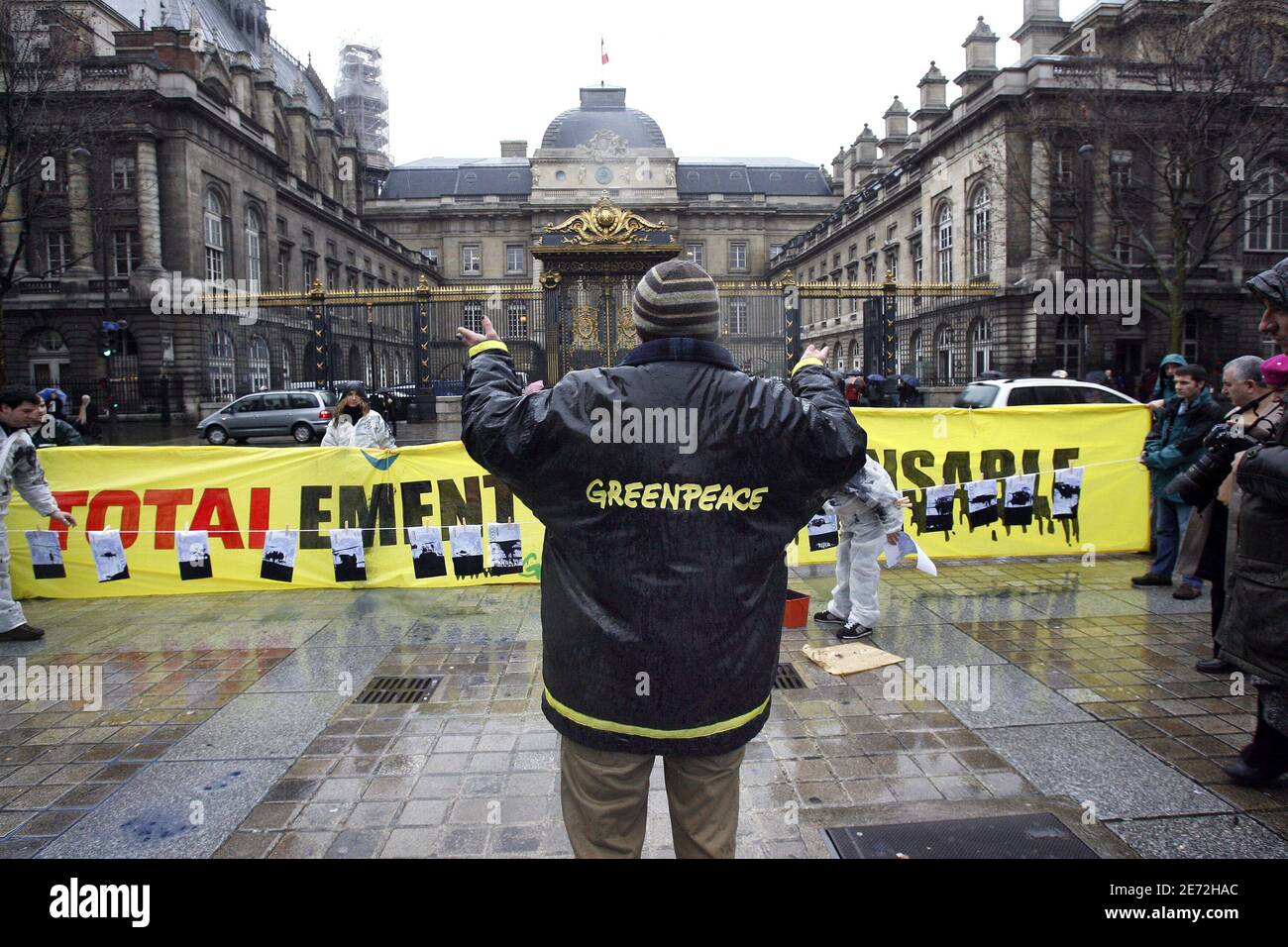 Greenpeace members protest in front of the courthouse during the Erika ...