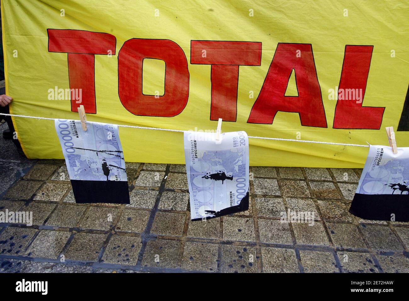Greenpeace members protest in front of the courthouse during the Erika ...
