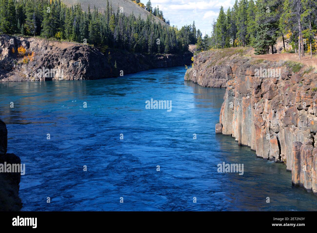 The Yukon River as it moves through Miles Canyon outside of Whitehorse ...