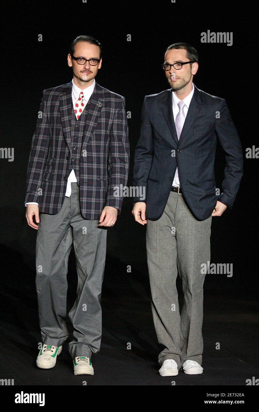 Dutch designers Viktor & Rolf make an appearance on the catwalk after ...