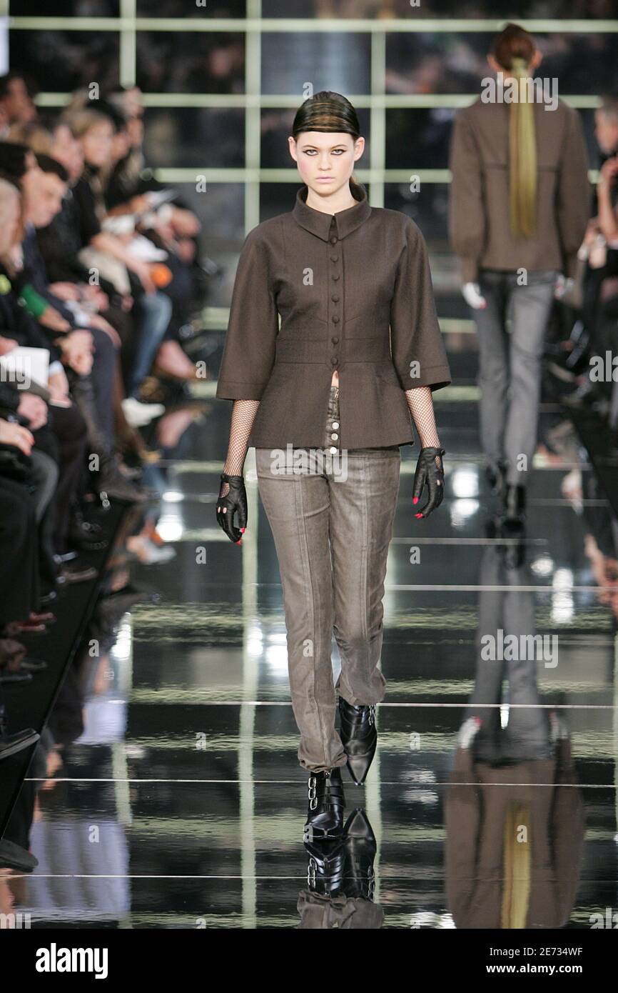 A model on the catwalk wears a creation by Karl Lagerfeld for his Fall ...