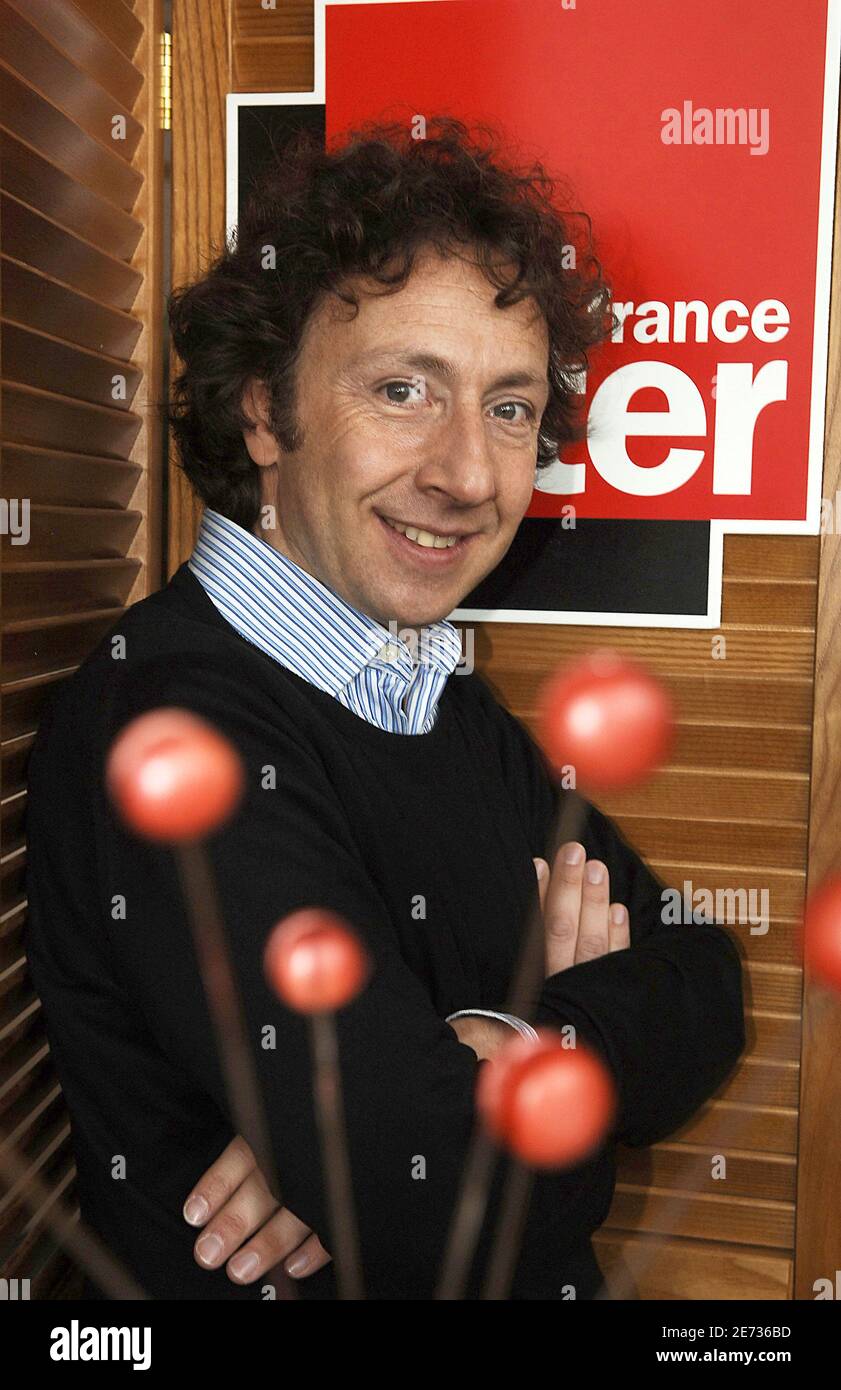 French anchorman Stephane Bern poses beside a France Inter logo as he ...