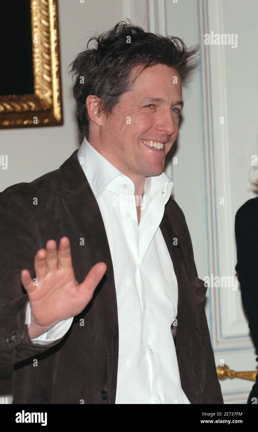 British actor Hugh Grant poses for pictures during a photocall held at ...