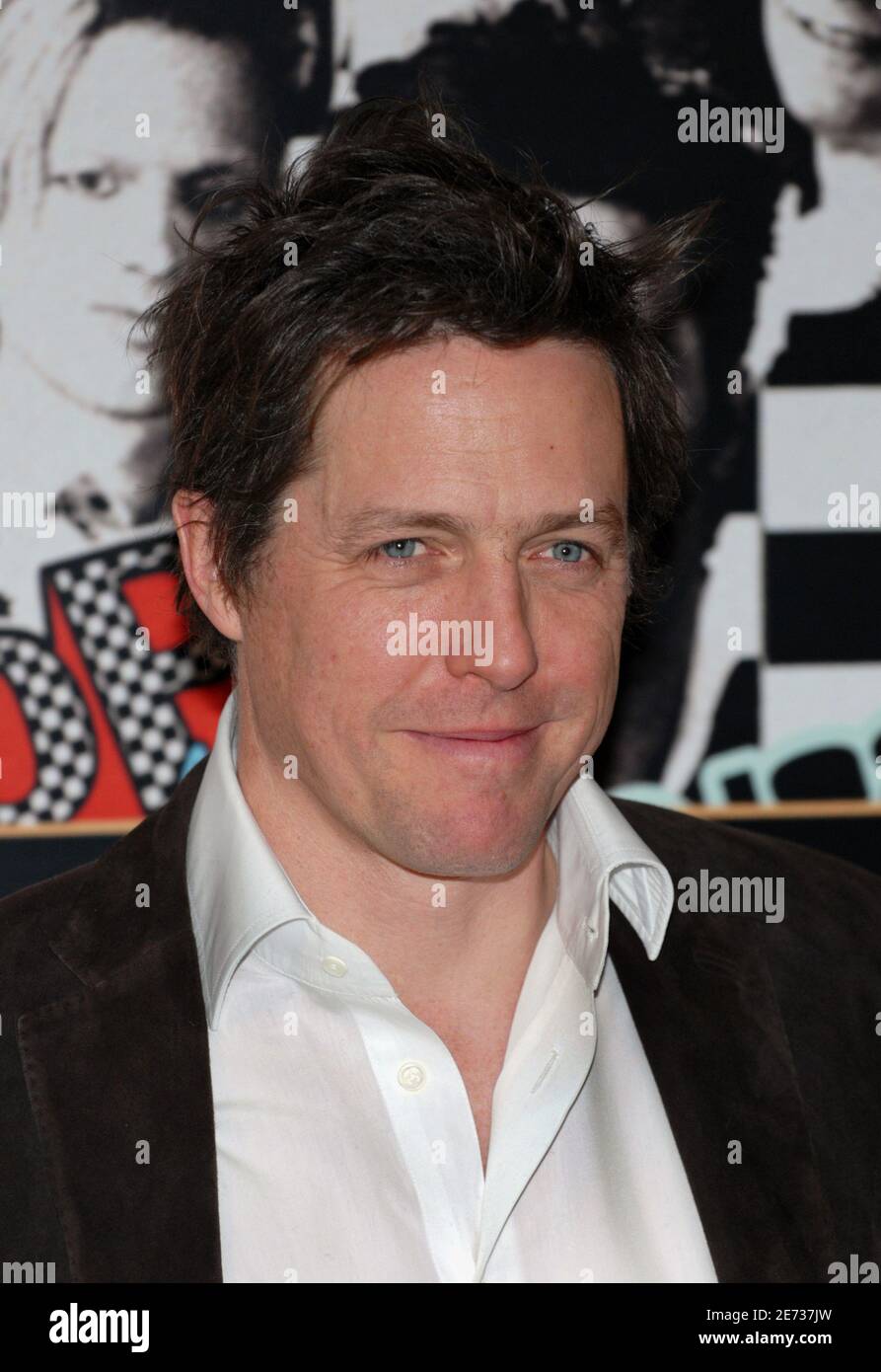 British actor Hugh Grant poses for pictures during a photocall held at ...