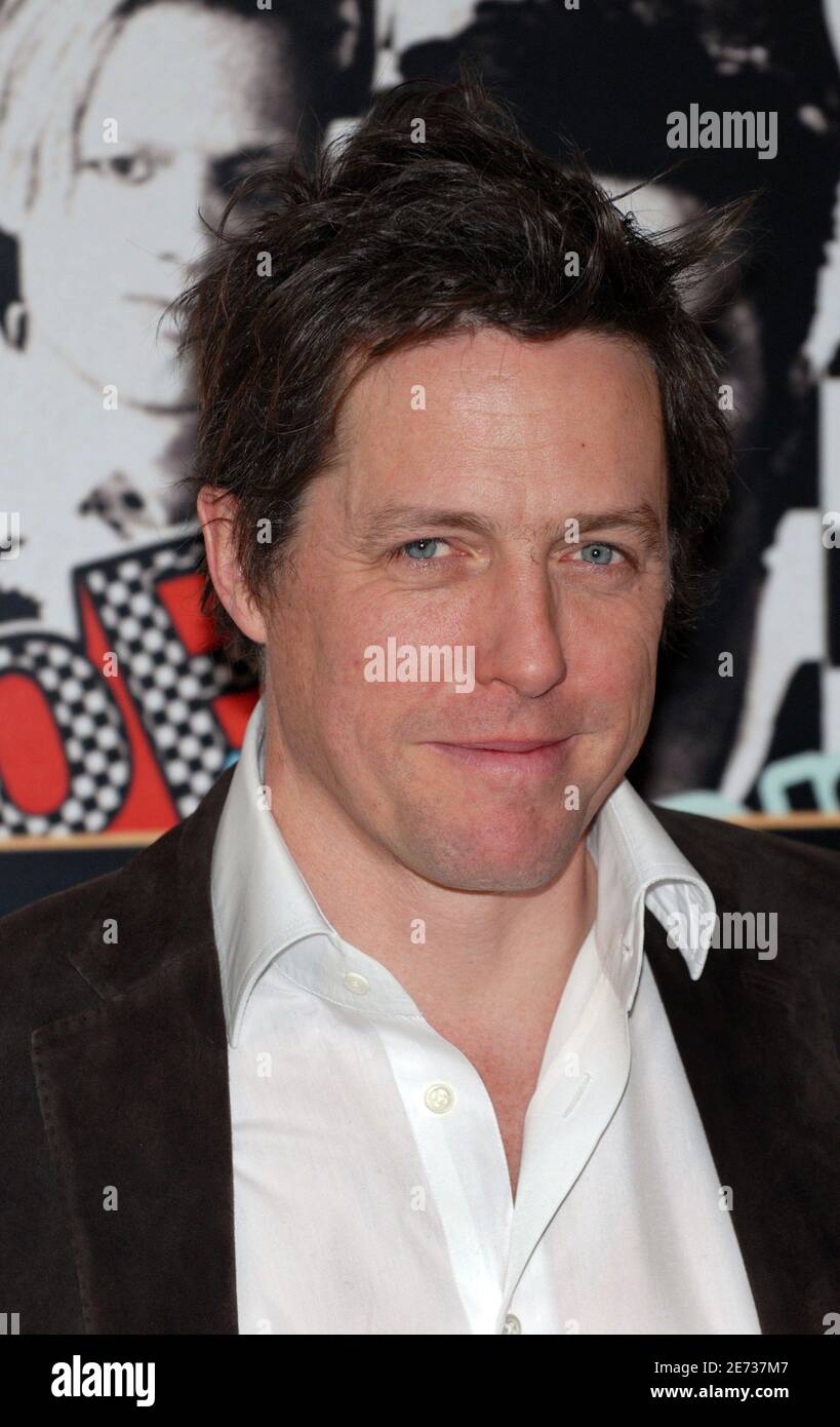 British actor Hugh Grant poses for pictures during a photocall held at ...