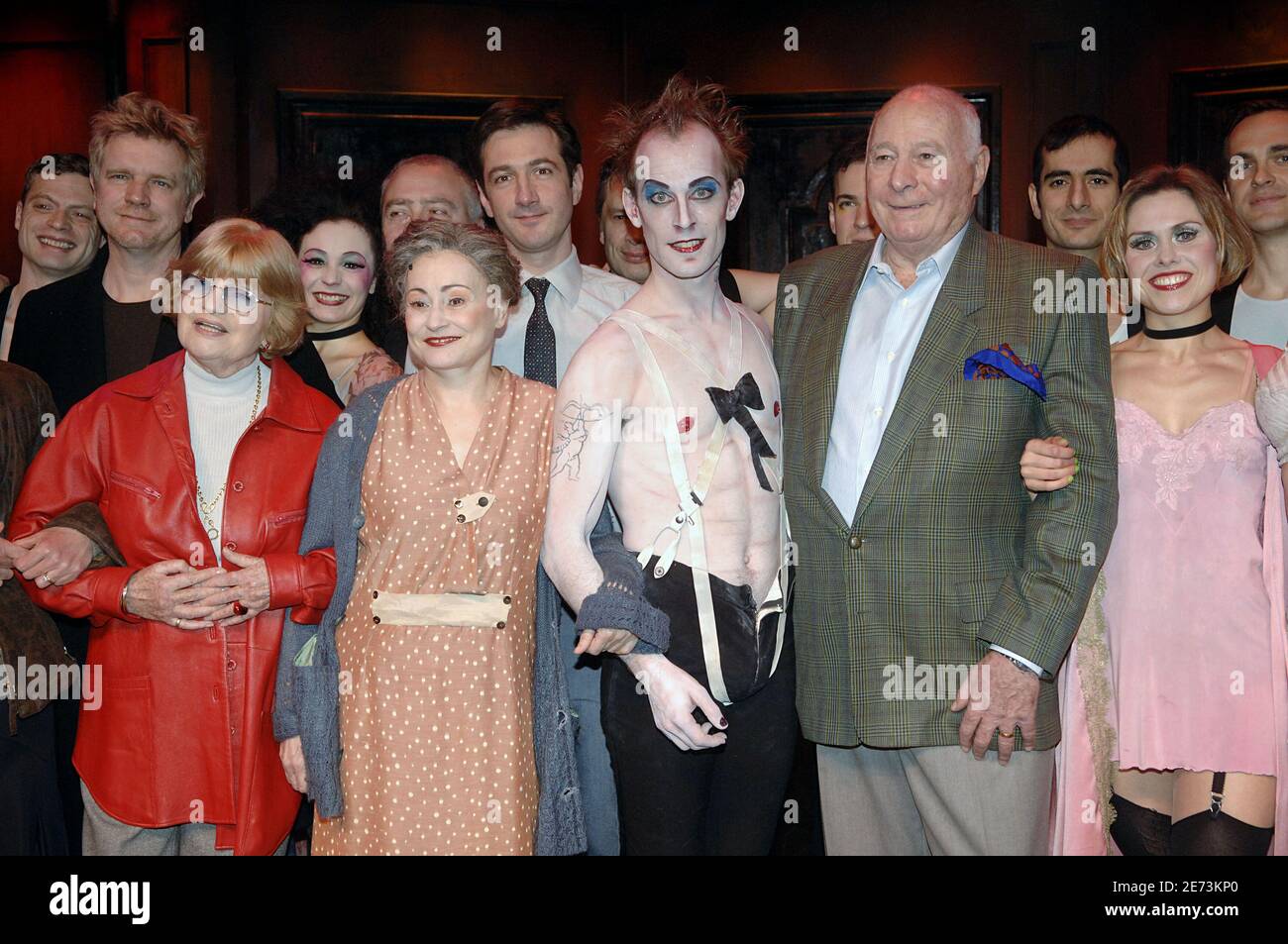 Jacques Collard poses with cast members of the musical 'Cabaret' at the ...