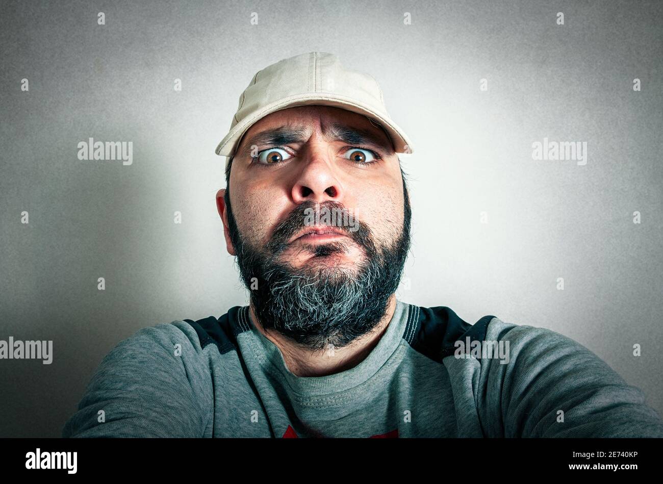 Funny man with the beard making expressions Stock Photo - Alamy