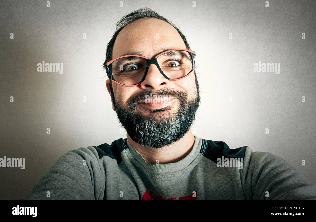 Funny man with the beard making expressions Stock Photo - Alamy