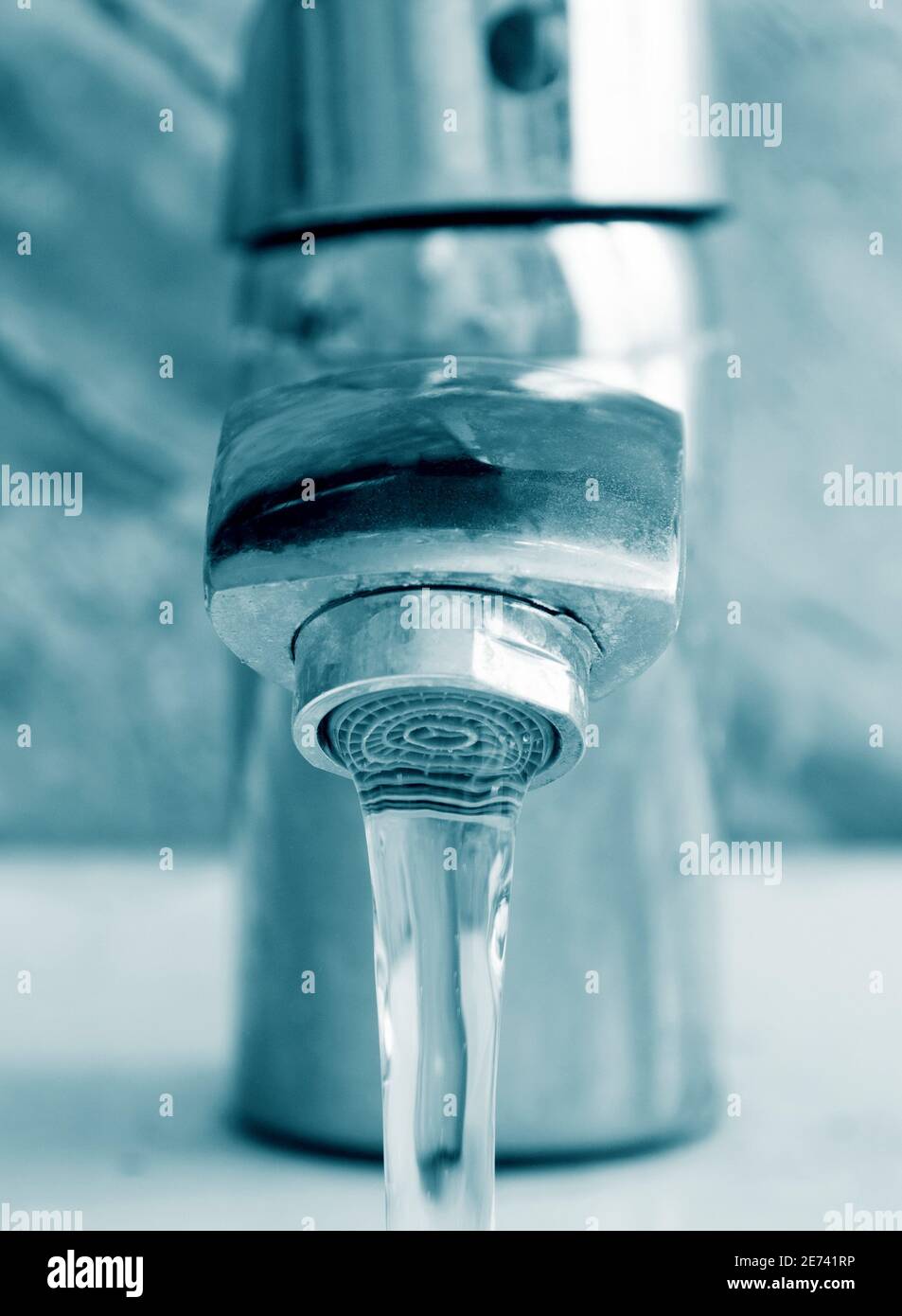 Closeup of the flowing water from the tap Stock Photo - Alamy