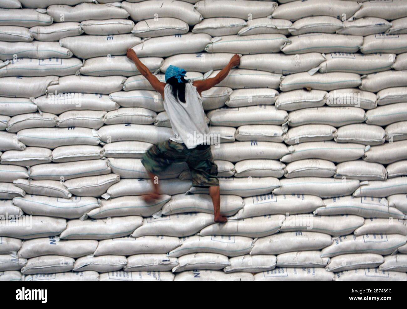 Warehouse stacked with sacks High Resolution Stock Photography and ...