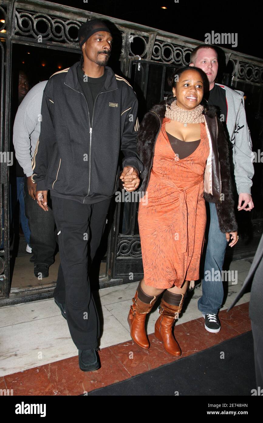 Snoop Dogg aka Calvin Broadus and his wife arrive at the VIP Room night ...