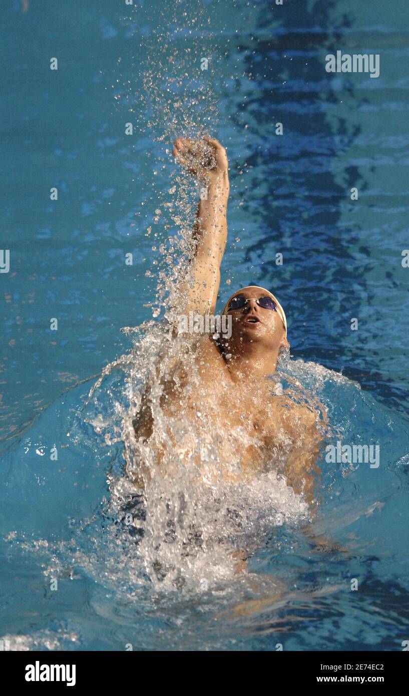 USA's Aaron Peirsol competes on men's 100 meters backstroke heat during ...