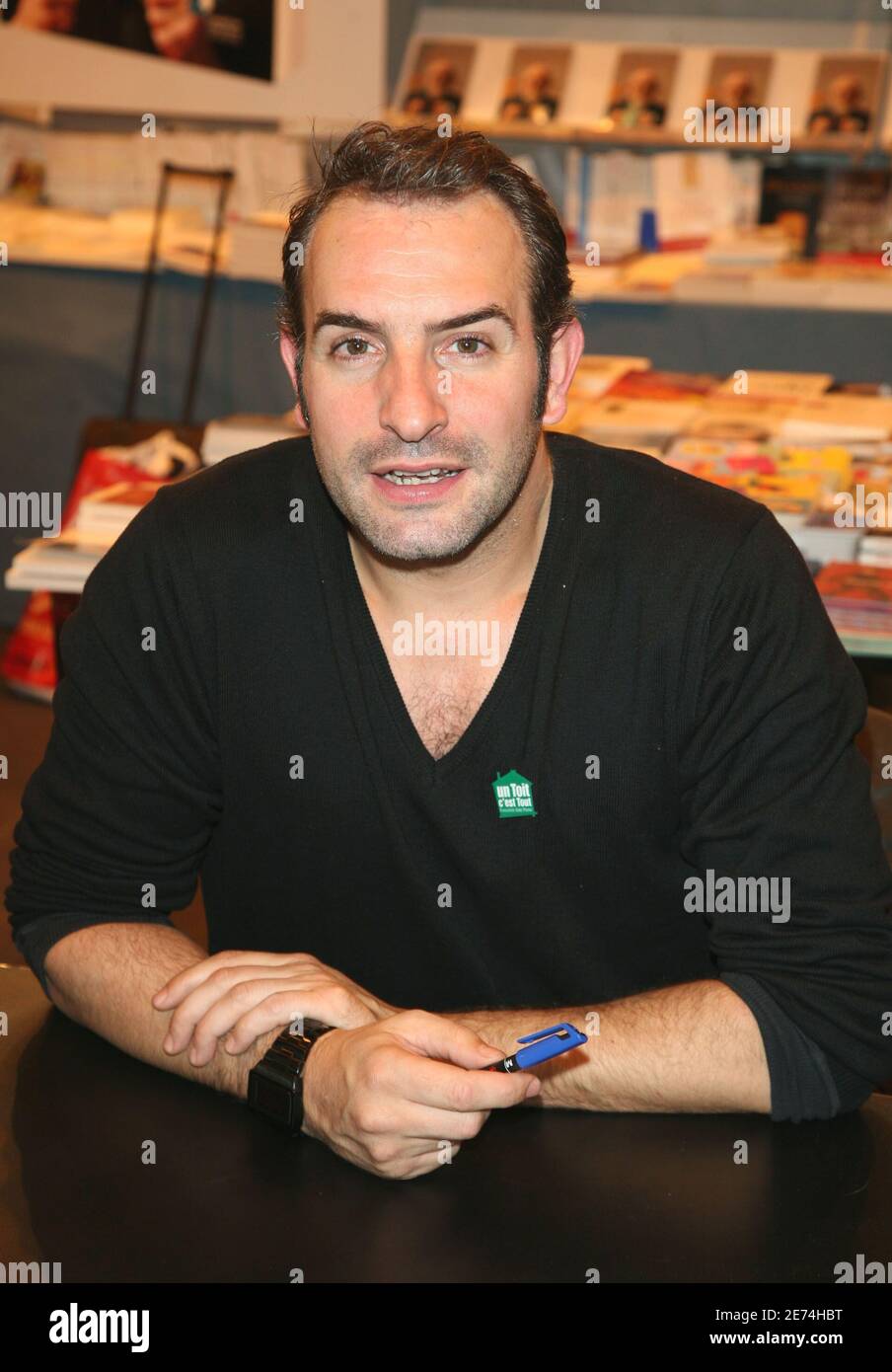 French actor Jean Dujardin poses during the final day of Paris Book ...