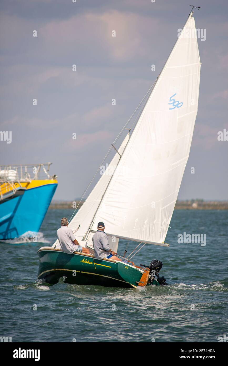 Traditional sailboat is sailing upwind in the Bassin d'Arcachon ...