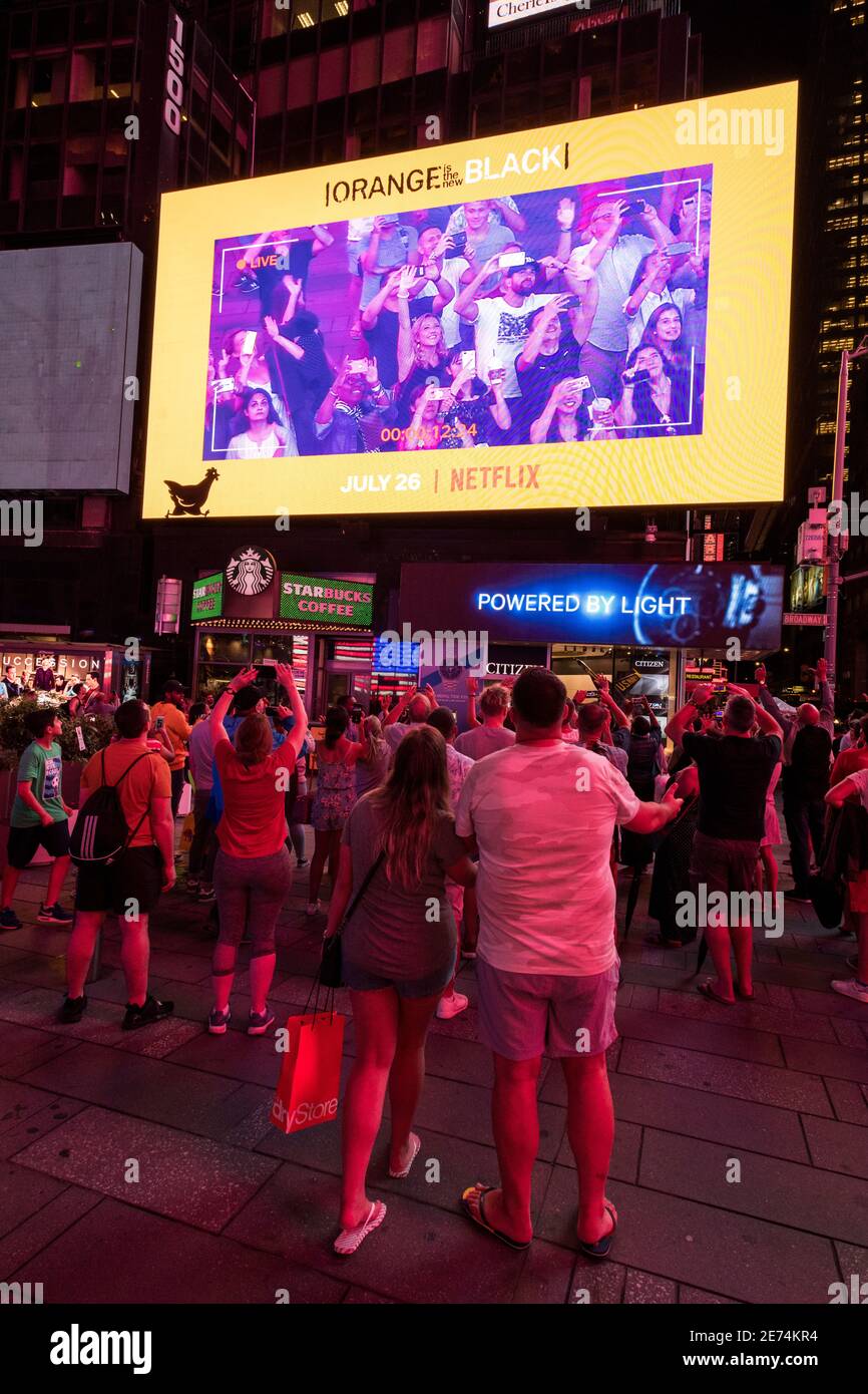 New York, USA. 22 Jun, 2019. A crowd in Times Square early in the night ...