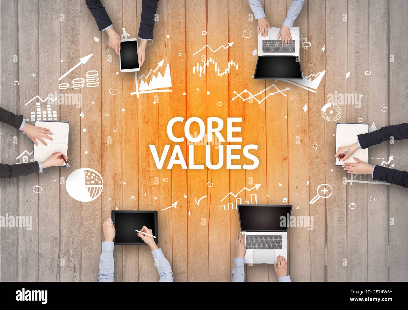 Group of Busy People Working in an Office with CORE VALUES inscription ...