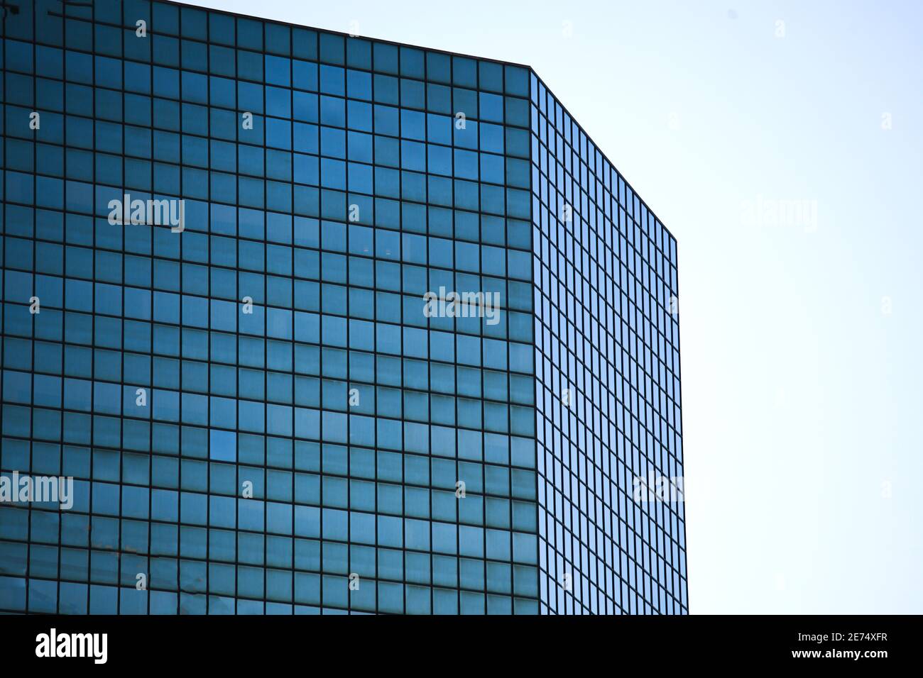 tall modern architecture business office building. Blue glass ...