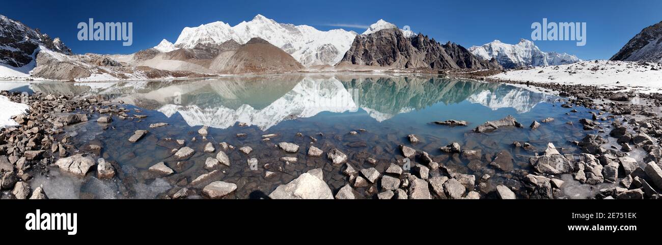 view of Cho Oyu mirroring in lake - Cho Oyu base camp - Everest trek ...