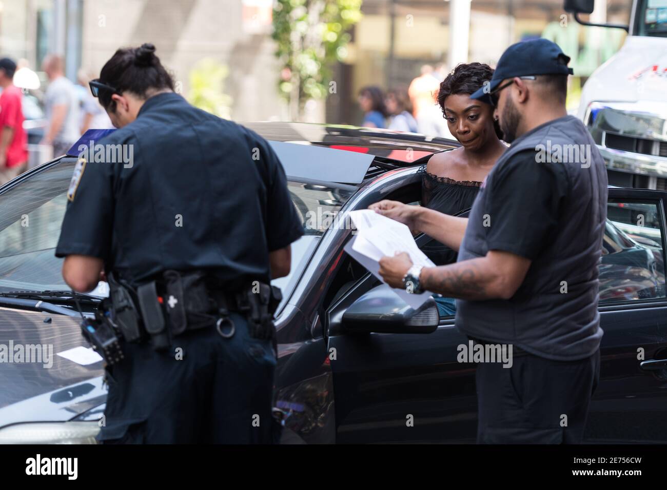 New York, USA. 23 Jun, 2019. NYPD writting a parking ticket in Times ...