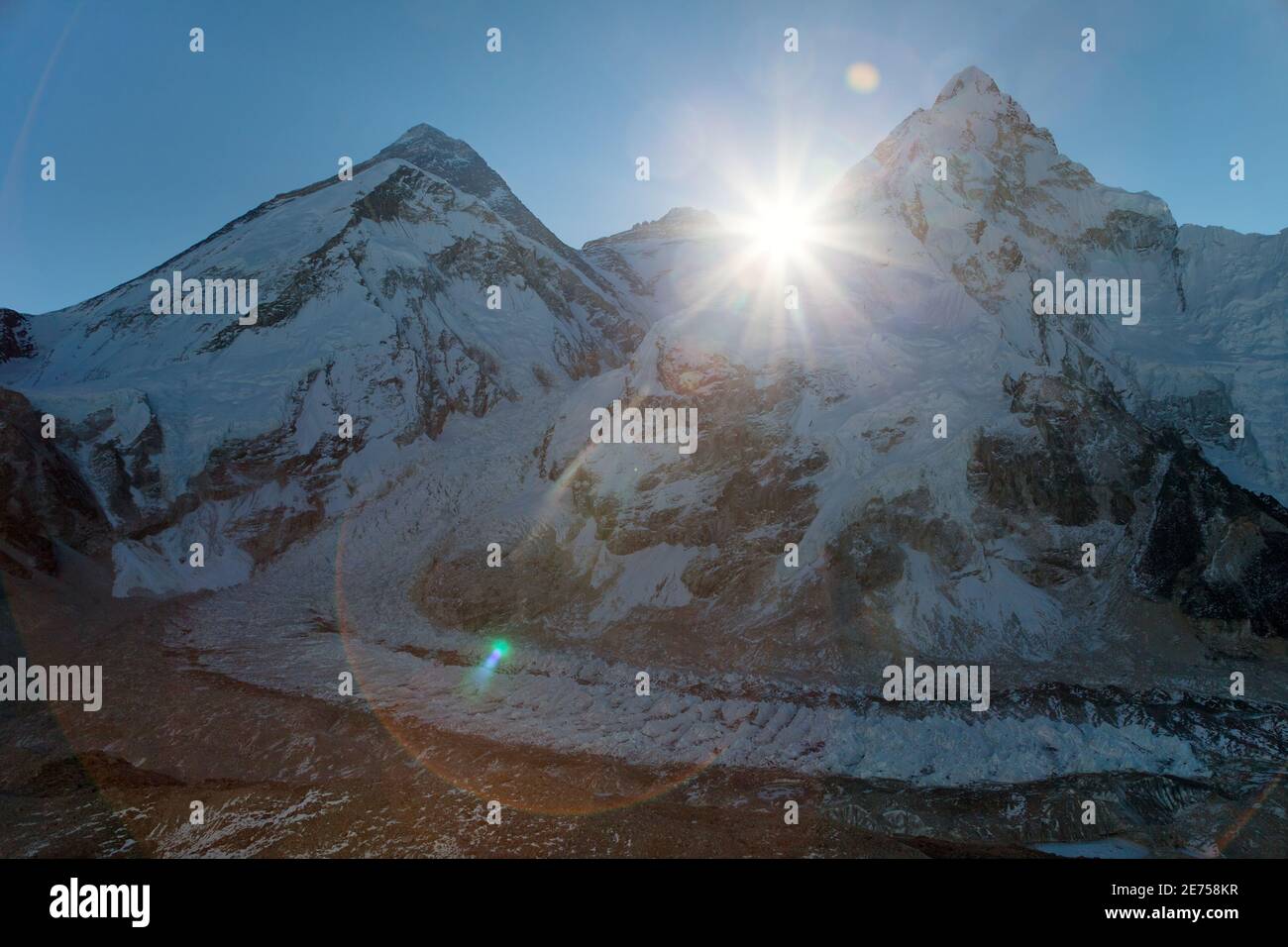 Morning sun above Mount Everest, lhotse and Nuptse from Pumo Ri base ...