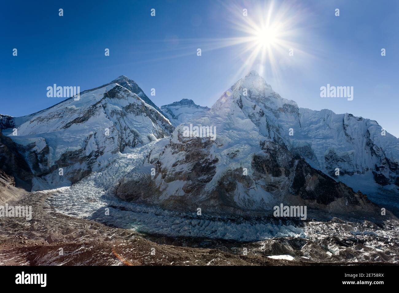 Morning sun above Mount Everest, lhotse and Nuptse from Pumo Ri base ...