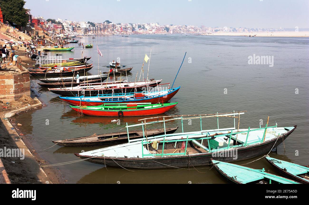 View of Varanasi with boats on sacred Ganga River - Uttar Pradesh ...