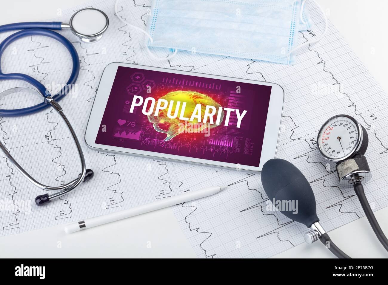 Tablet pc and medical tools with POPULARITY inscription, social ...