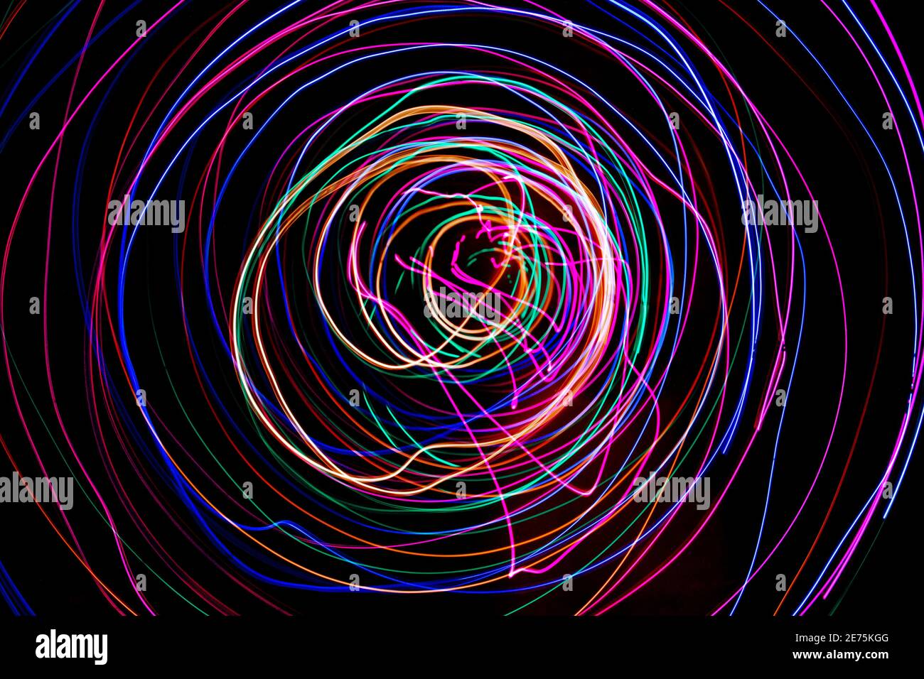 Multi color light painting photography, swirl and curve of blue, green ...