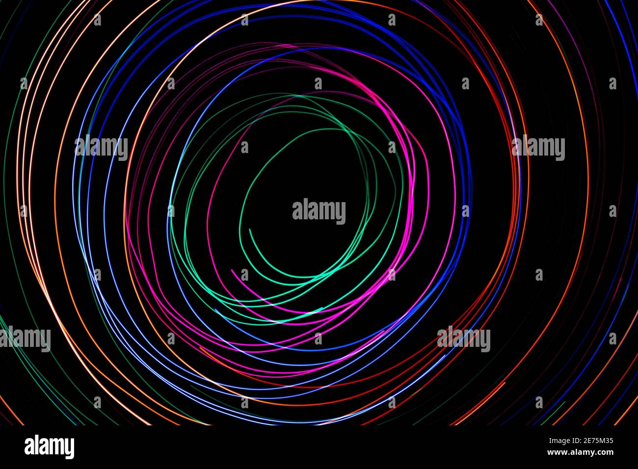 Multi color light painting photography, swirl and curve of blue, green ...