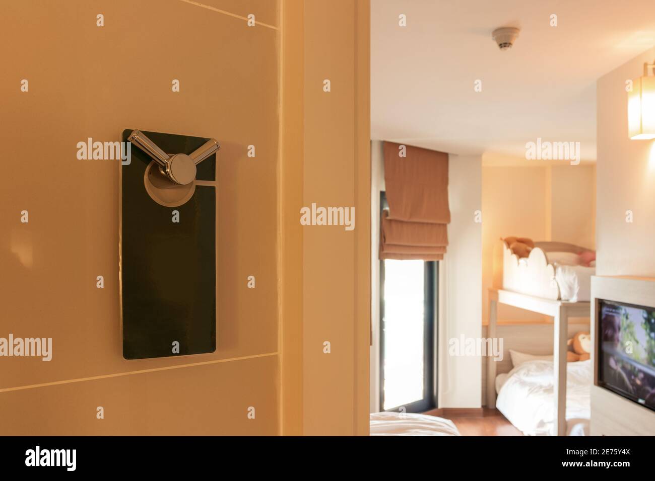 Open the door, the hotel room has a sign on the door Stock Photo - Alamy