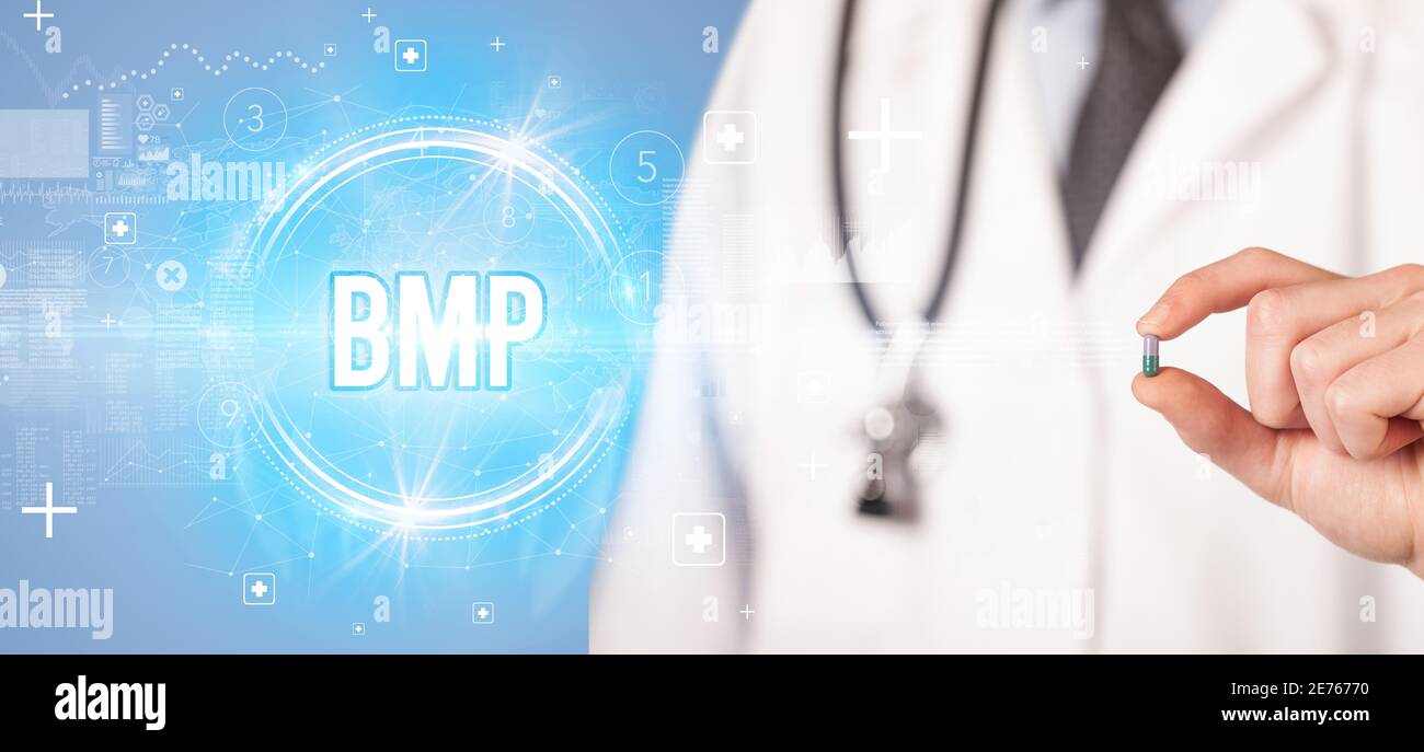 Close-up of a doctor giving you a pill with BMP abbreviation, virology ...