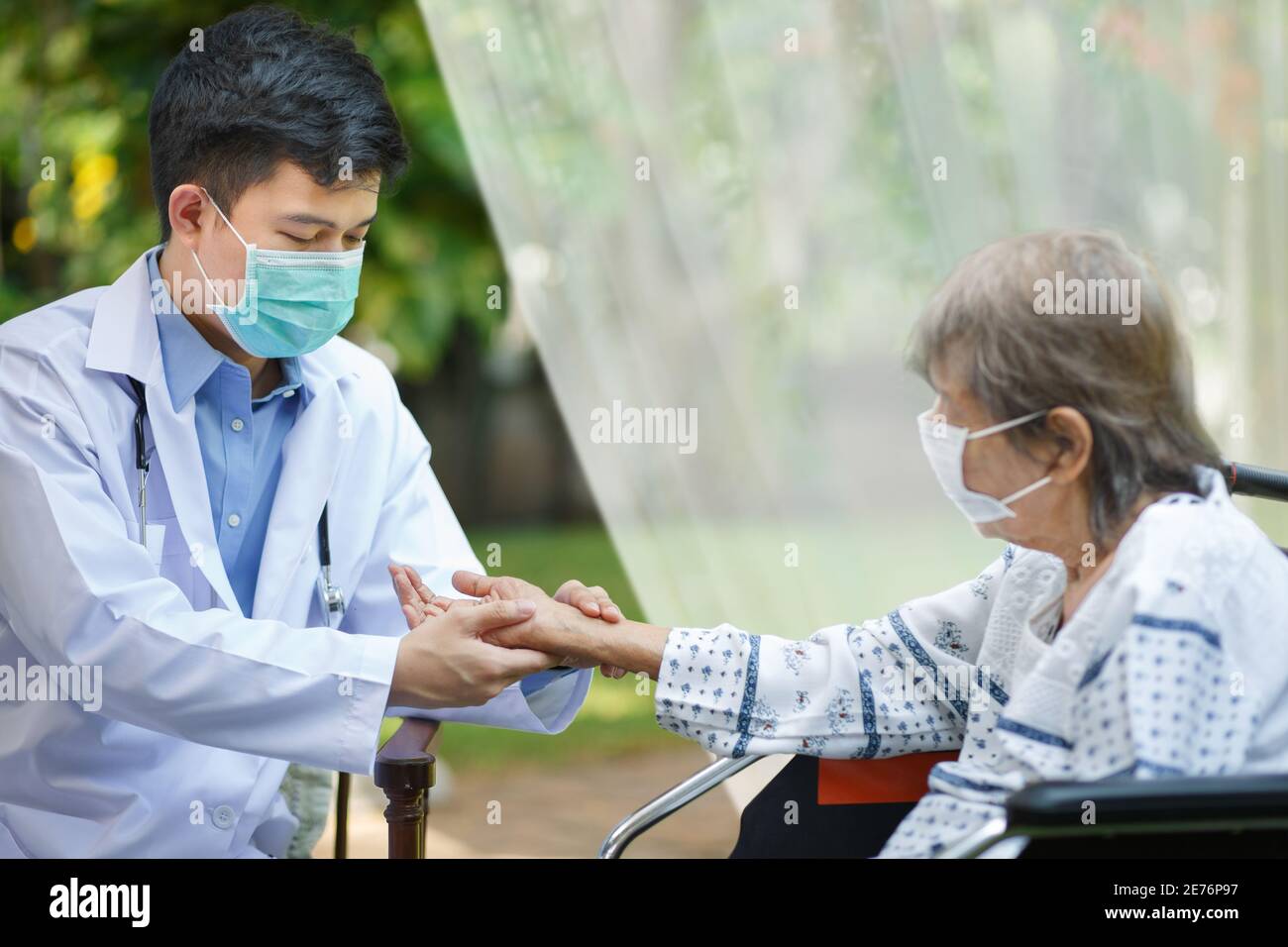 Doctor Check Heart Rate Pulse On Patient Wrist Stock Photo - Alamy
