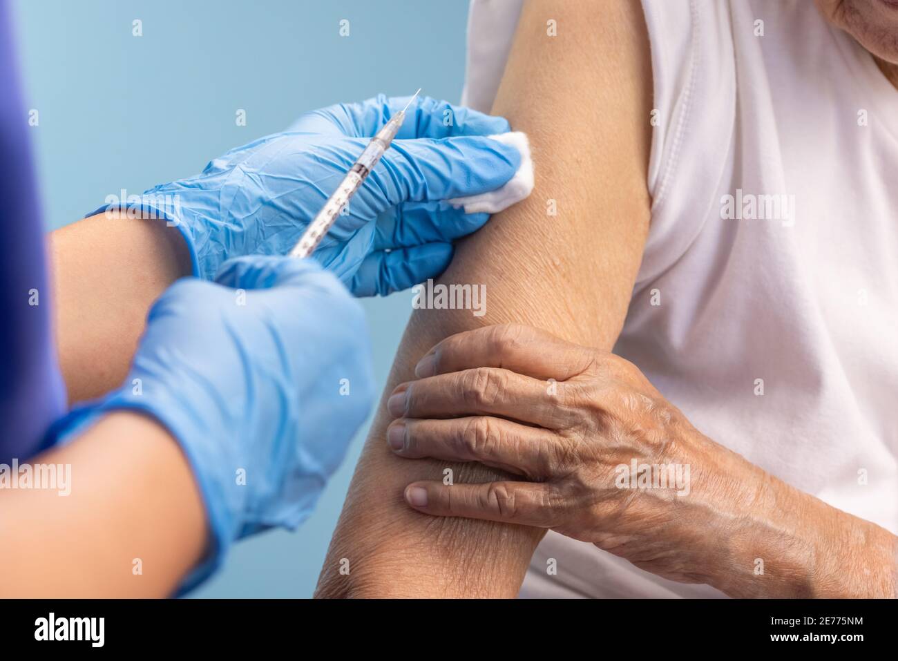 Closeup nurse doing vaccine injection hi-res stock photography and ...