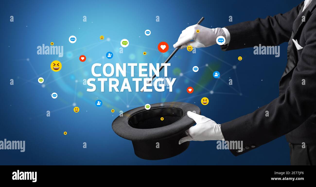 Magician is showing magic trick with CONTENT STRATEGY inscription ...