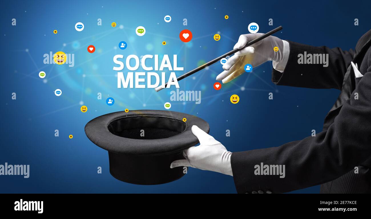 Magician is showing magic trick with SOCIAL MEDIA inscription, social ...