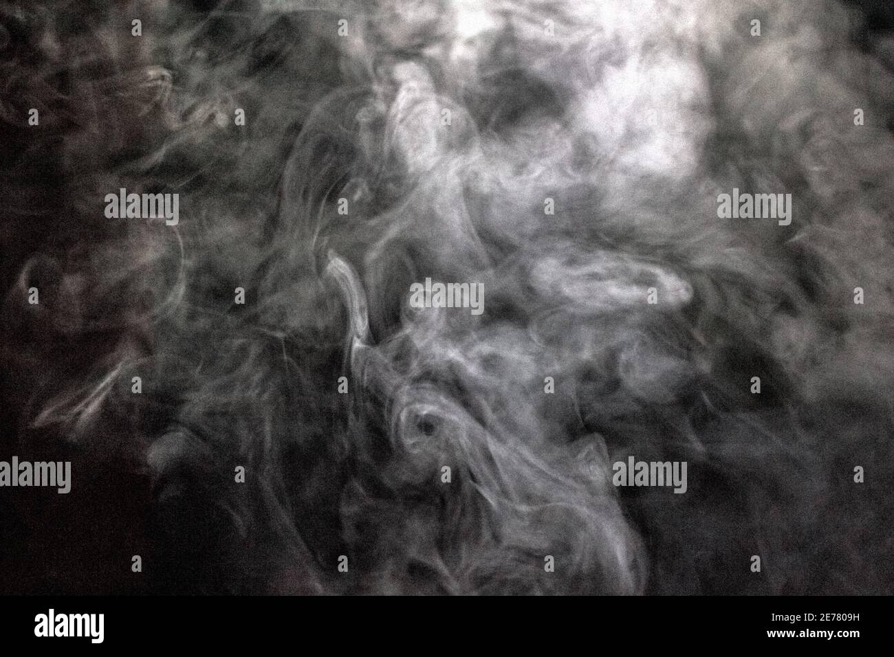 Original cigarette smoke with special noise effect in dark and light ...