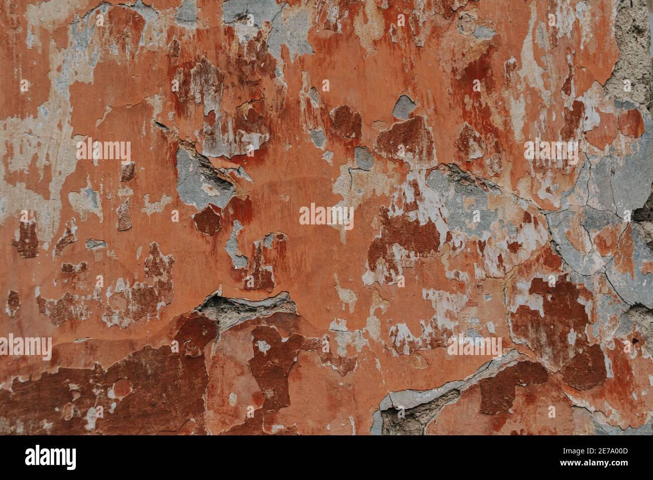 Multicolored background:concrete surface with peeling and cracked brown ...