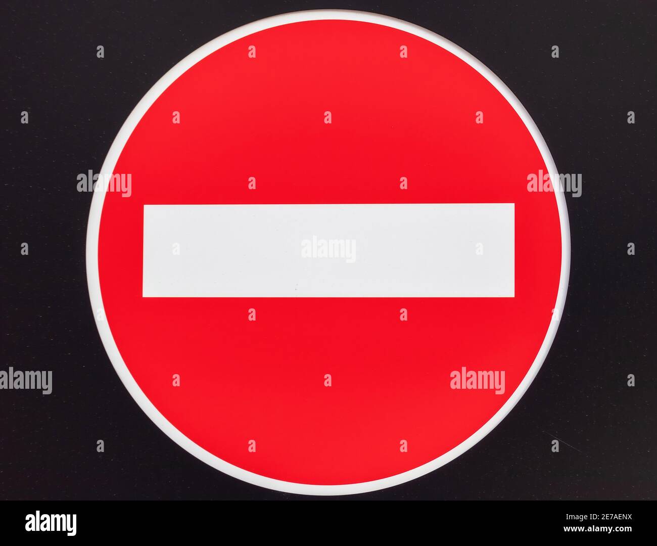 A red and white 'Cannot Enter' sign on a dark background Stock Photo ...